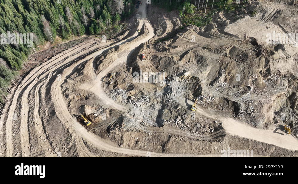 Industrial mine excavators are digging the soil in the construction ...