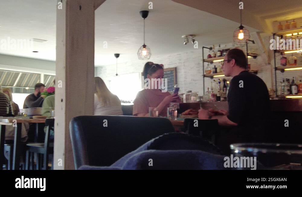 Left To Right Pan Masked Man With Bar Patrons And Then Three Masked ...