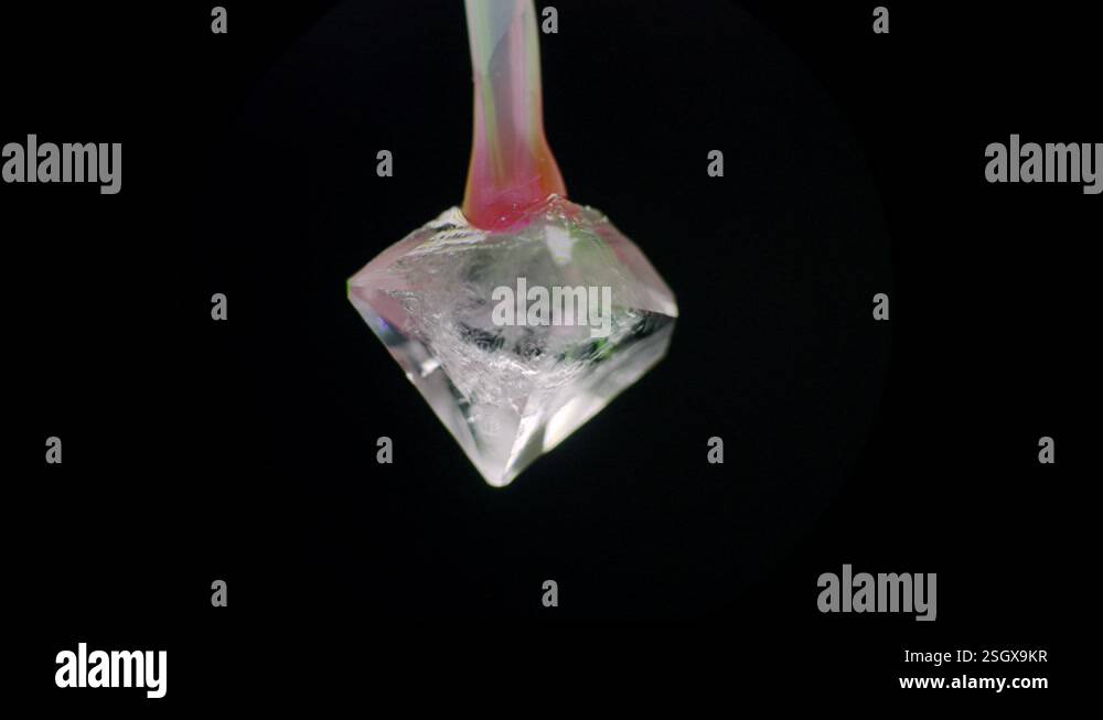 Timelapse of the growth of a mineral crystal from a solution physic ...