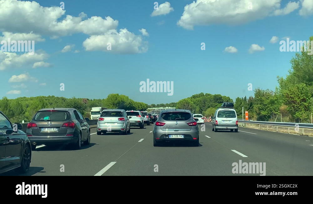 Highway driving through French roads with many cars and beautiful ...