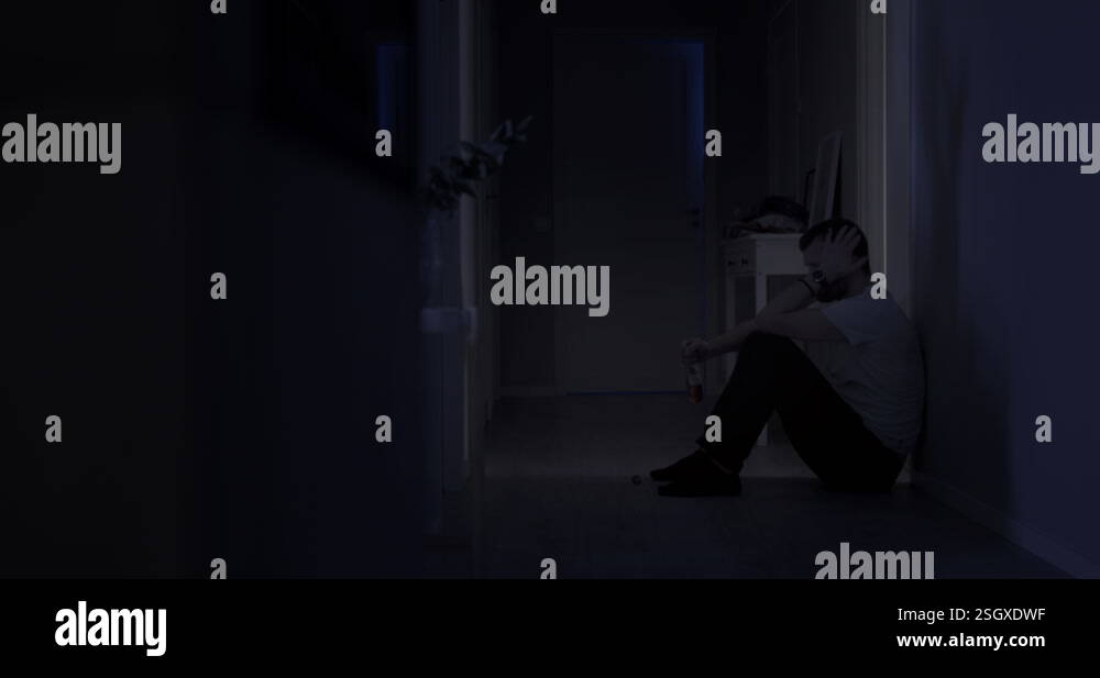 Drunk man in the dark feeling severe unbearable depression Stock Video ...
