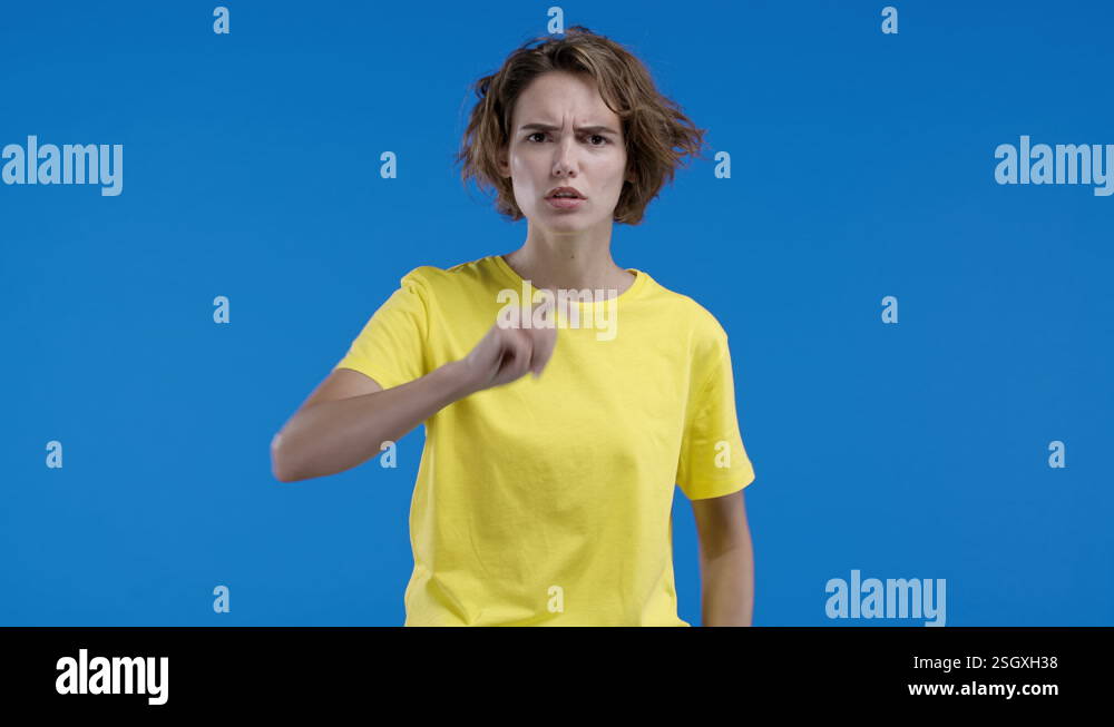 Dissatisfied woman disapproving with no finger warning sign, making ...