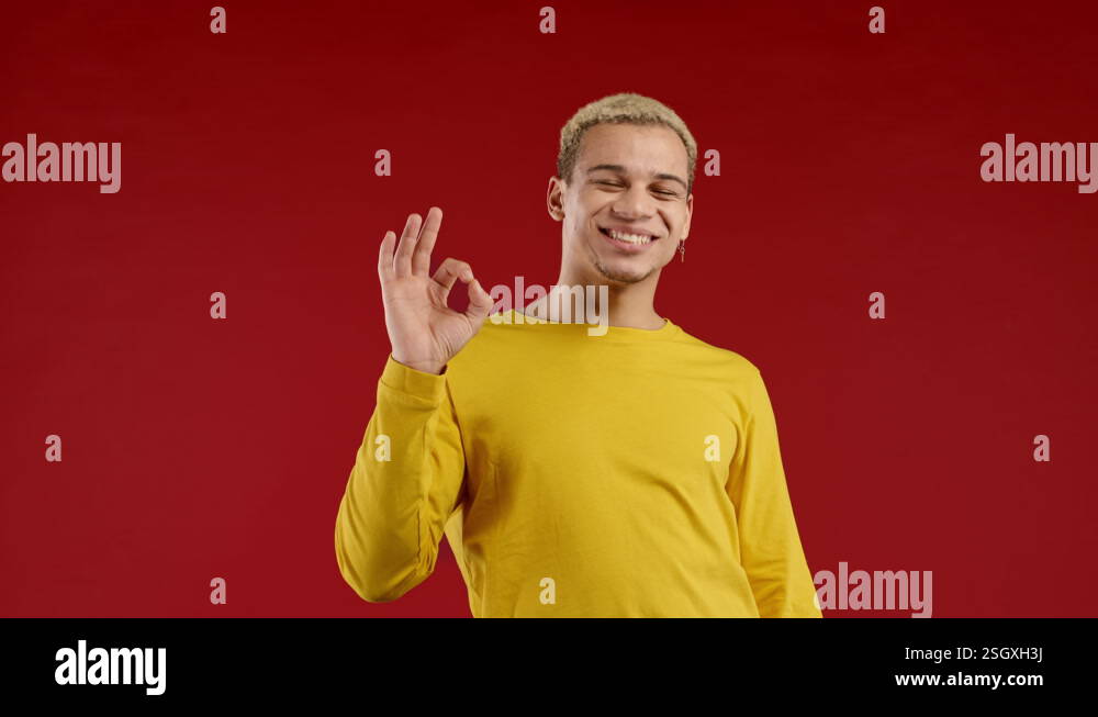 Handsome man makes hand sign okay, ok gesture. Happy guy, correct ...