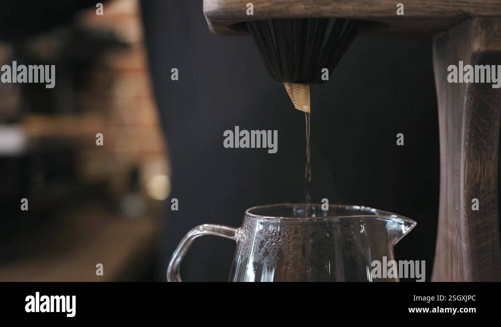 Process of making cup of coffee in V60. Barista at work make strong ...