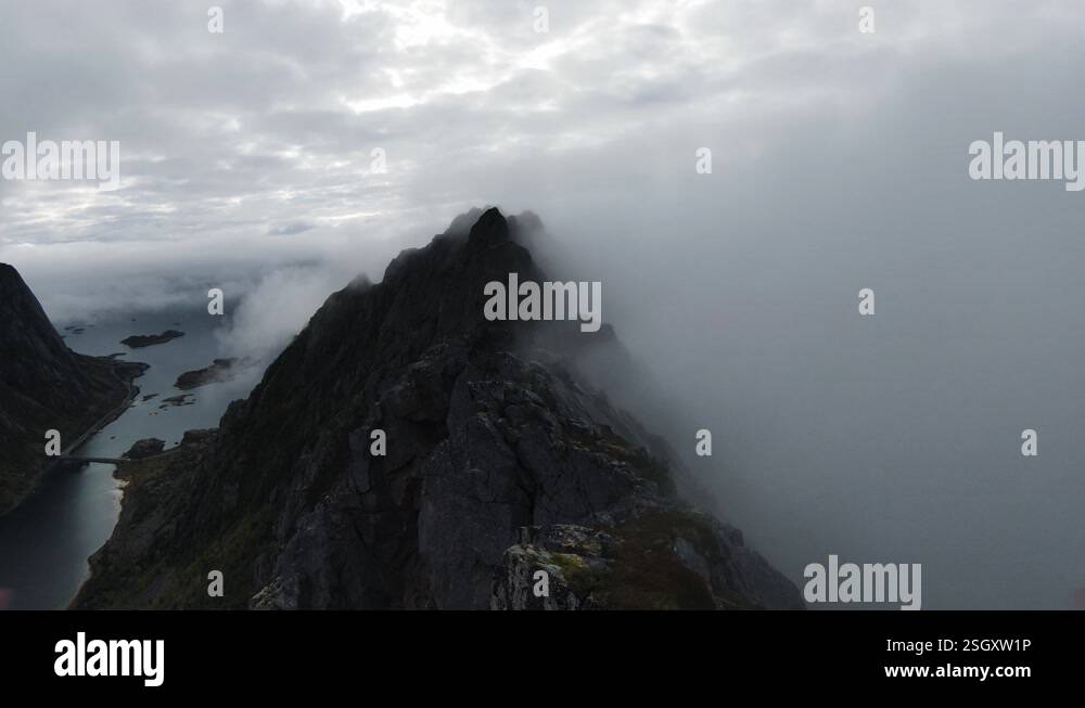 Flying along a mountain ridge in Norway, on the right no view through ...