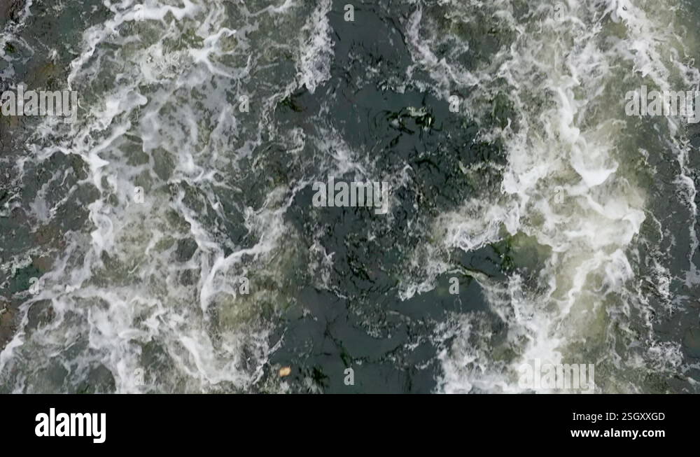 Muddy Water. Dirty Water Flow. Industrial wastewater and foam ...