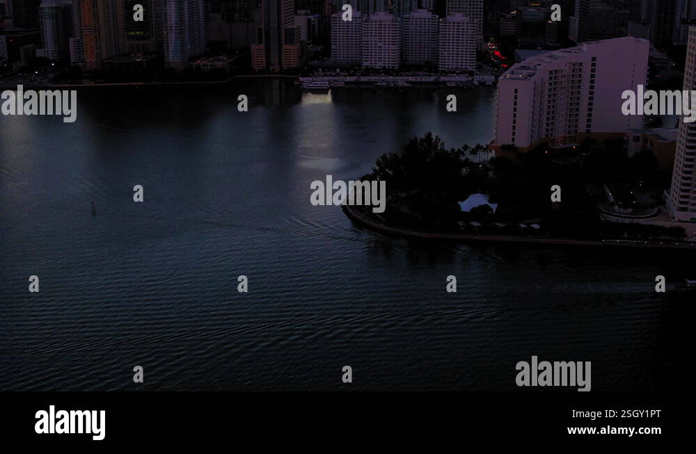 Aerial Tilt Up Shot Of Modern Residential Buildings Against Orange Sky ...