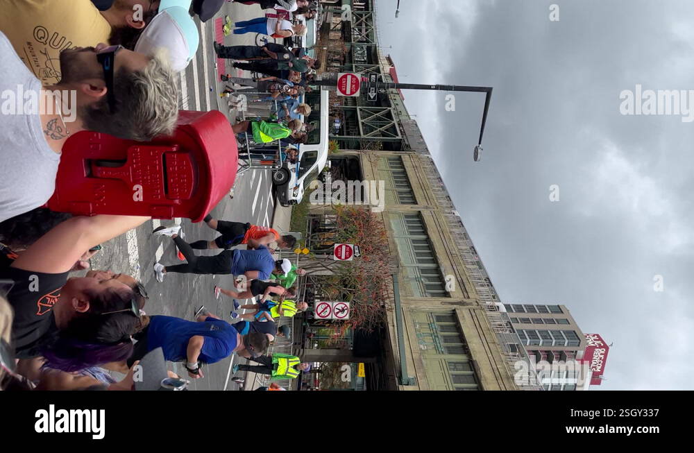 Vertical mobile phone video orientation. Sportsmen run at the New York ...