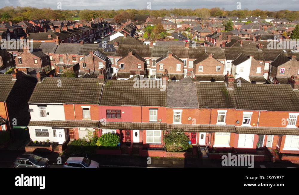Congested North West uk suburban housing estate aerial view panning ...
