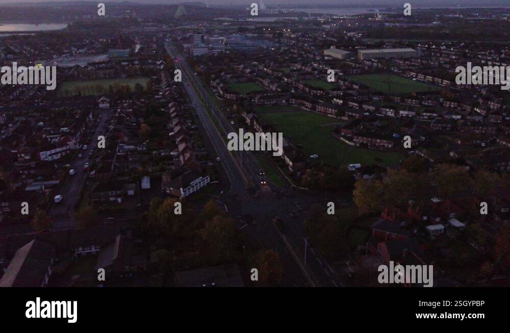 Dark Autumn morning aerial view orbiting Widnes industrial town Stock ...