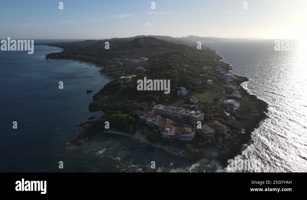 Caribbean island aerial drone footage at sunset of Bay Islands Roatan ...
