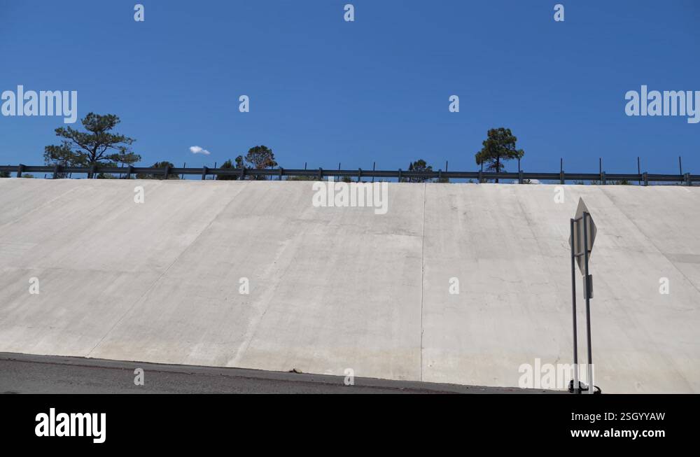 Driving by Concrete Barrier Landslide Protection on American Highway ...