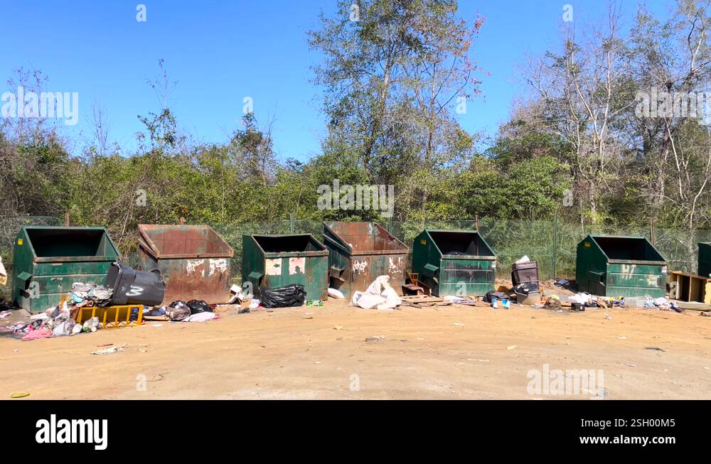 Rural County dump for household waste and trash lined up in a lot Stock ...
