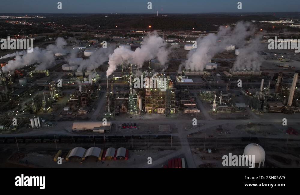 Oil and gas refinery in Tulsa Oklahoma USA. Aerial at night. Carbon ...