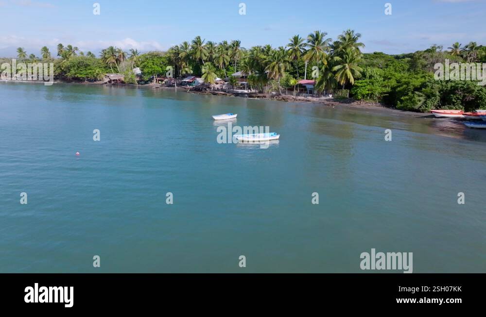 Small wooden boats moored at Palenque beach, San Cristobal in Dominican ...