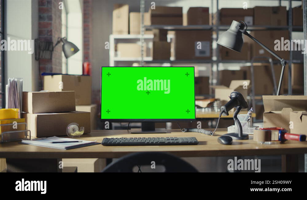Desktop Computer with Green Screen in Warehouse Stock Video Footage - Alamy