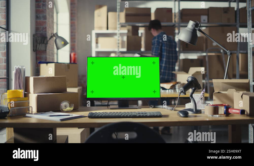 Desktop Computer with Green Screen in Warehouse Stock Video Footage - Alamy