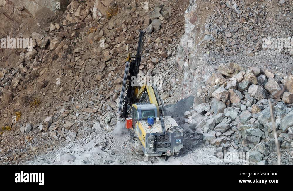 Drilling machine in open cast mining quarry Stock Video Footage - Alamy