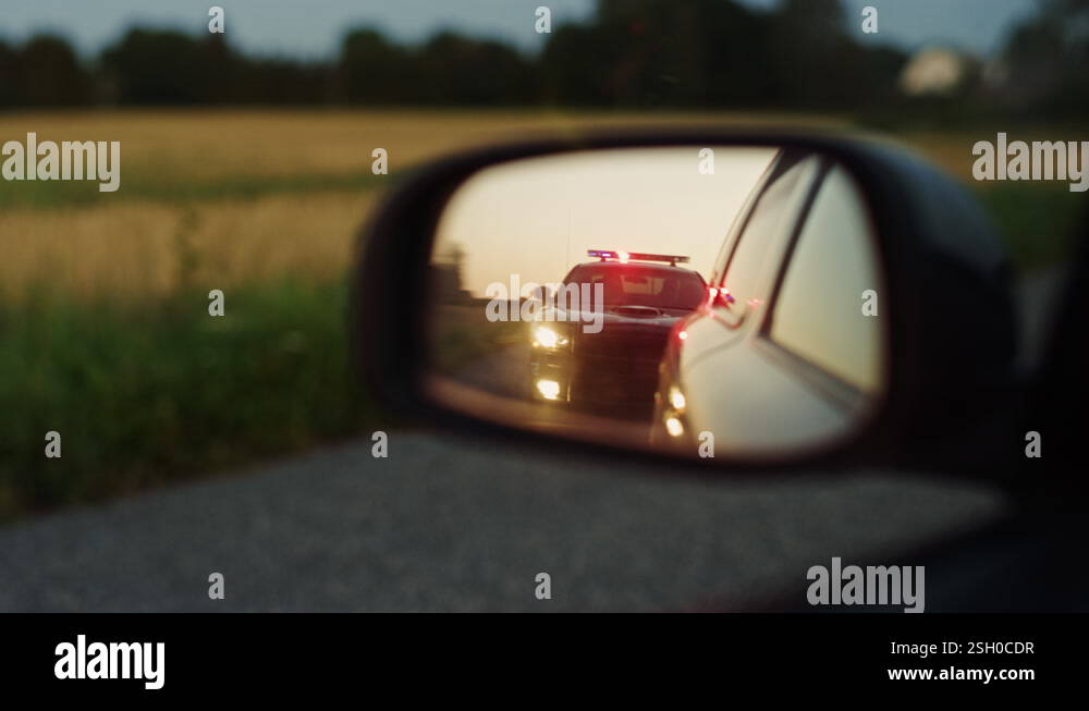 Police Car Pursuit Side Mirror Shot Stock Video Footage - Alamy