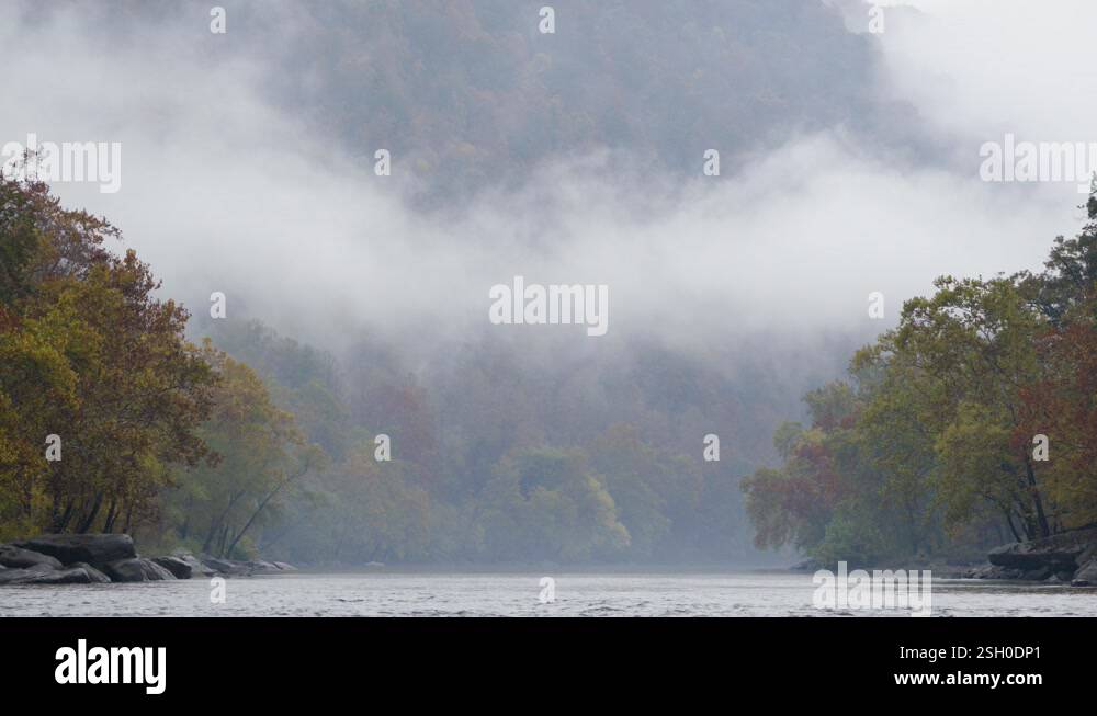 Static shot of mist rising through the valley at the river Gorge Stock ...
