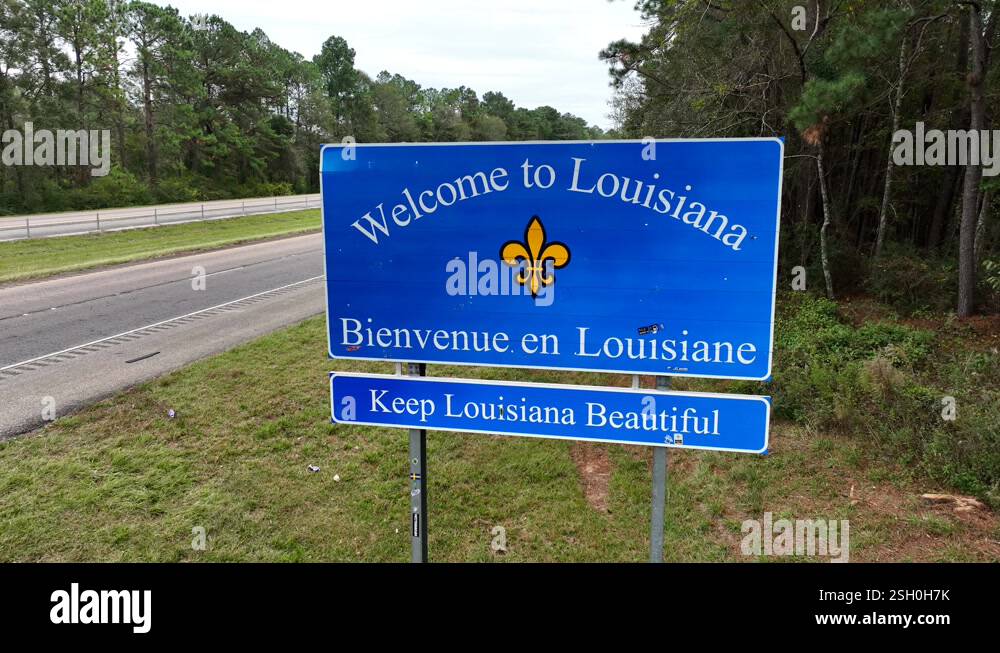 Welcome to Louisiana. State sign along interstate highway border with ...