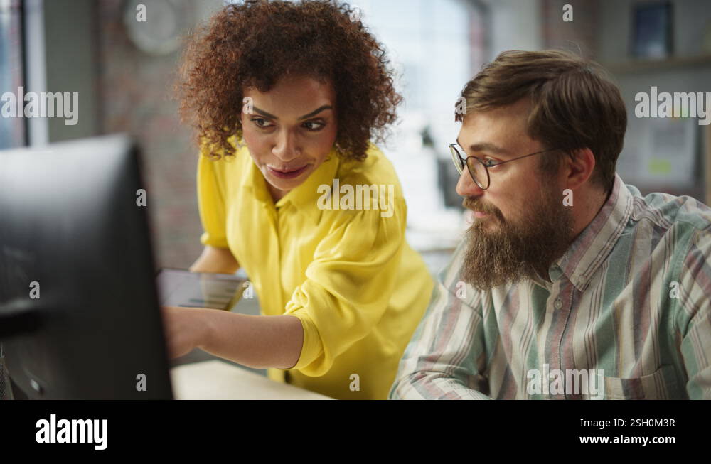 People Discussing Work Using Computer in Office Stock Video Footage - Alamy