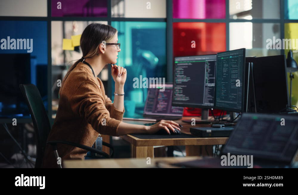 Woman Writes Code On Desktop Computer In Office Stock Video Footage - Alamy