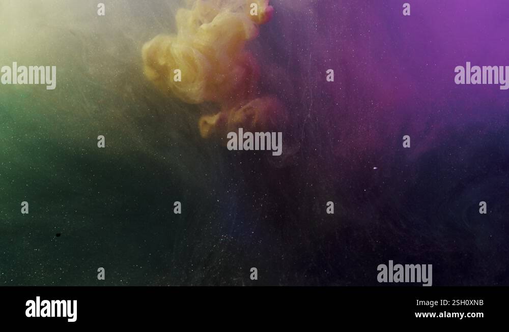 Shot of color paint drops in water with abstract color mix. Drop of ...