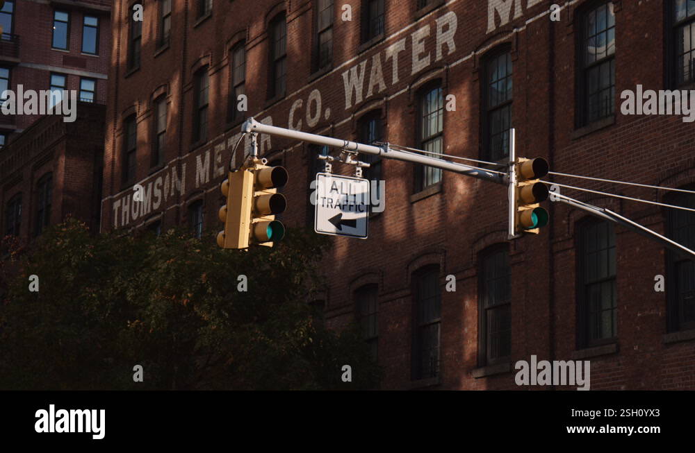 New York city traffic light with building behind, handheld view Stock ...