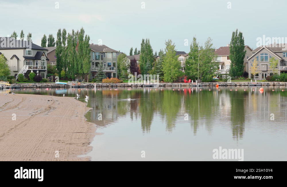 Private beach with lakefront home in nice community Stock Video Footage ...