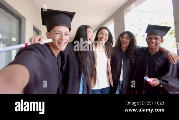 Diverse group of students celebrates graduation. Teenage Biracial and ...
