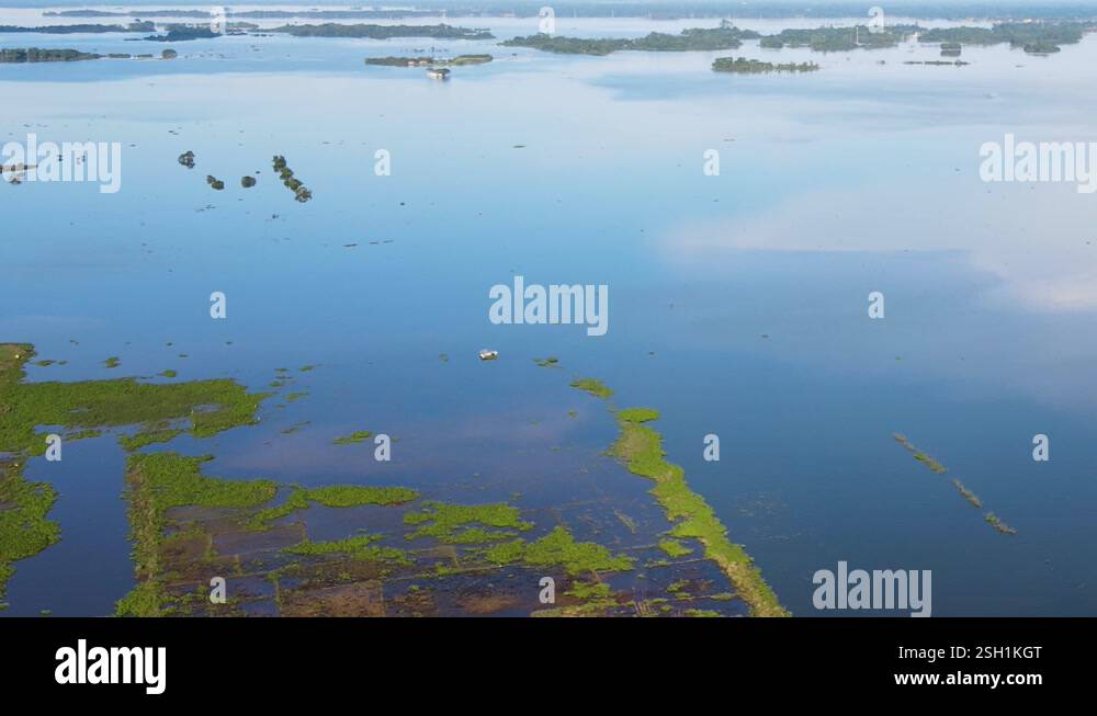 Flooded land in Bamgladesh. Land under water. Global warming effects ...