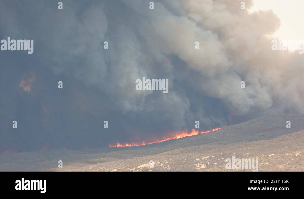 Massive Burning Fields in Fire and Dense Fluffy Puffs of Smoke in Hemet ...