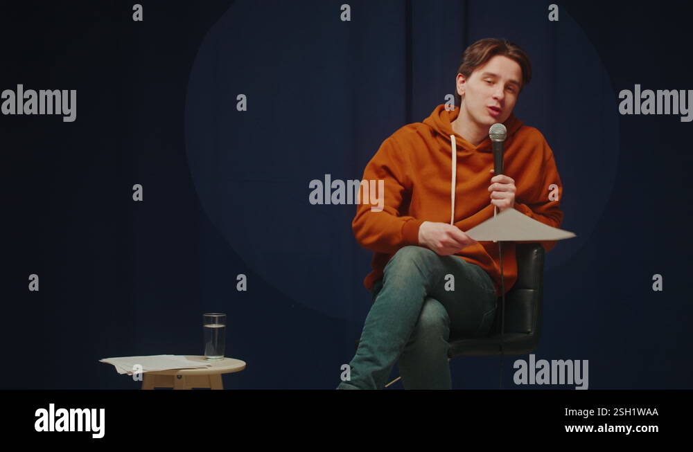 StandUp cafe, comedy concert. Man telling jokes on stage. Male comedian ...