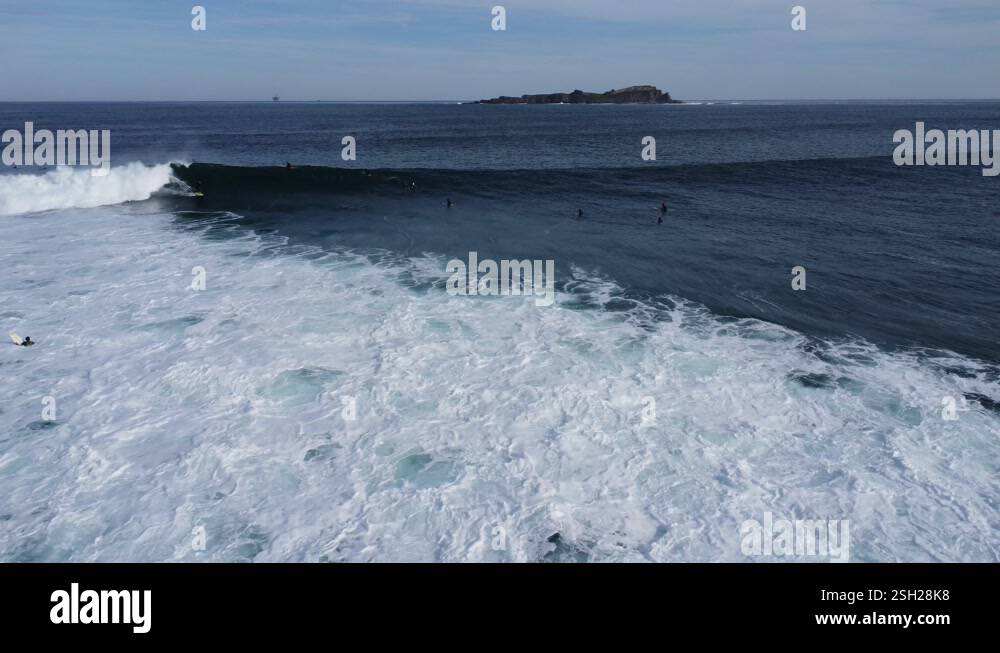 many surfers in the lineup at the famous big wave of mundaka in basque ...