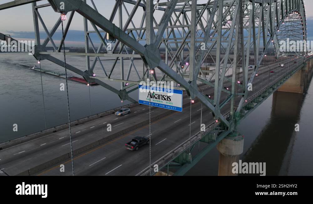 Hernando de Soto Bridge with Welcome to Arkansas state sign. Border of ...