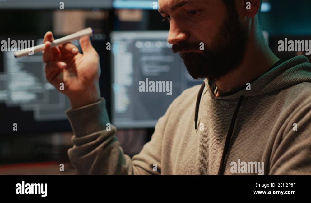 Pensive database admin brainstorming ideas in office Stock Video Footage - Alamy