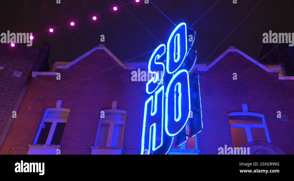 Soho District Illuminated Neon Light Sign In Aesthetic Blue Along The ...