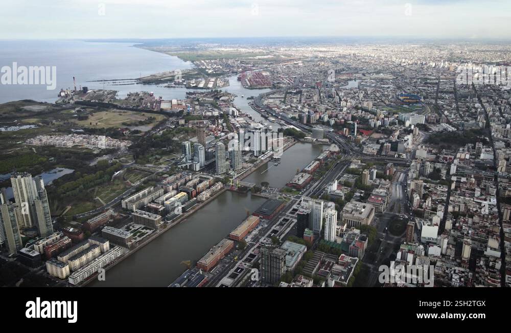 Aerial view of Puerto Madero with Rio Darsena Sur and the docks in ...