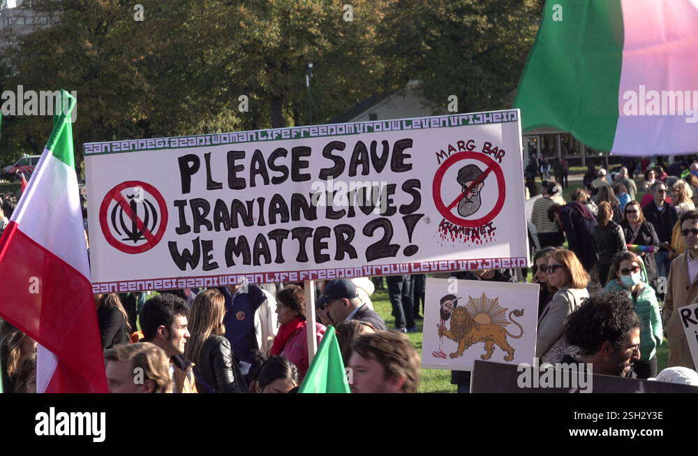 Crowds with flags banners attend support rally Iran, Mahsa Amini ...