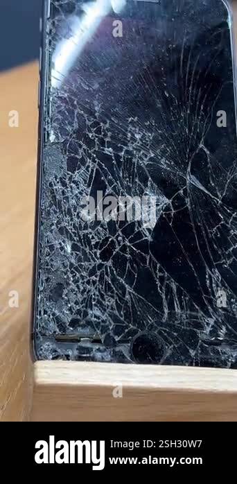 Broken phone screen. Smartphone glass with numerous cracks. Faulty ...