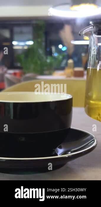 Cup Black Milk Tea . Brewed Herbal Leaf. Pouring Milk On Tea Cup ...