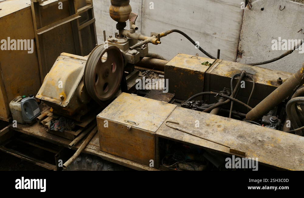 drilling rig, heavy flywheel rotates Stock Video Footage - Alamy