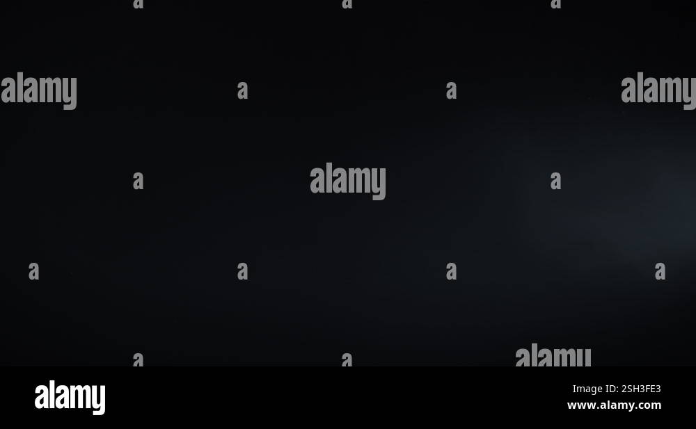 Layered VFX atmosphere. 4K slow-motion VFX smoke appears from the side ...