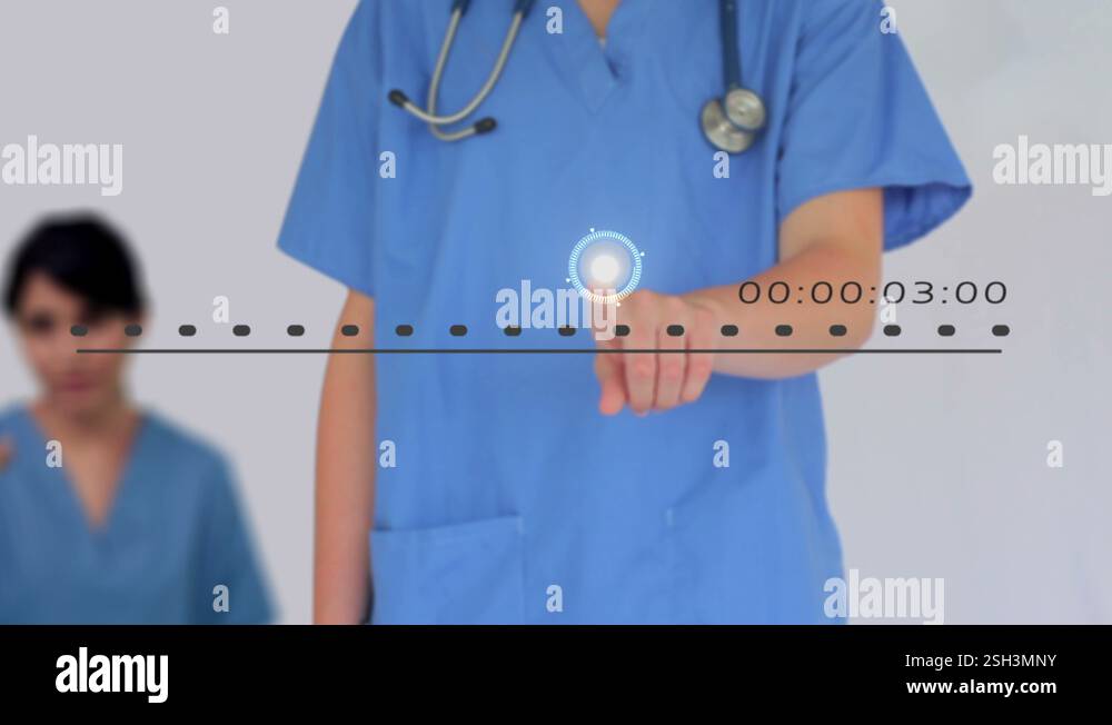 Nurse using digital touchscreen to look at various medical images Stock ...