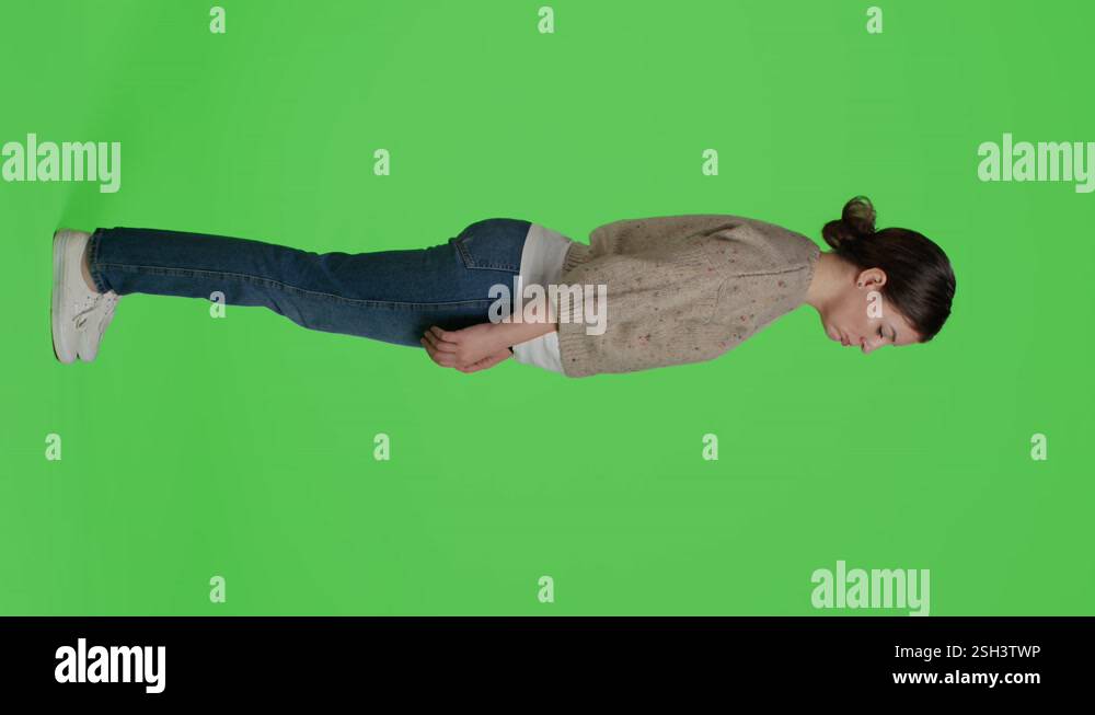 Vertical video: Profile of sad person posing over full body backdrop ...