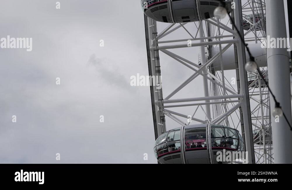 Close-up London Eye giant observation wheel. Famous tourist attraction ...