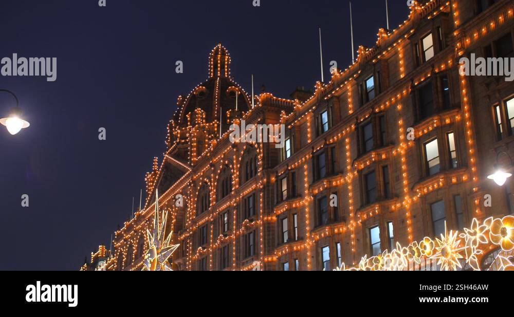The Iconic Facade Of Harrods Department Store All Light Up During Stock ...