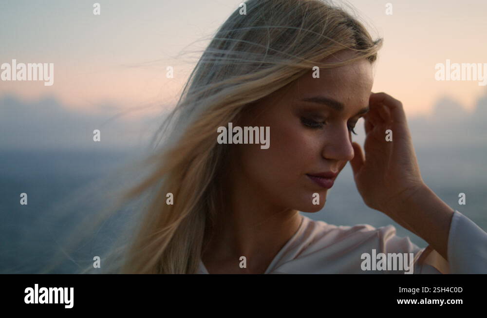 Traveler face smiling camera at ocean nature. Dreaming woman on sea ...