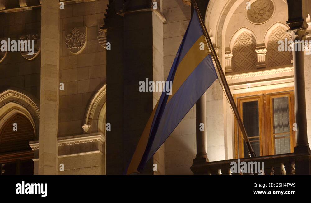 Flag Of The Szekelys Blowing With The Wind On The Balcony Of Parliament ...